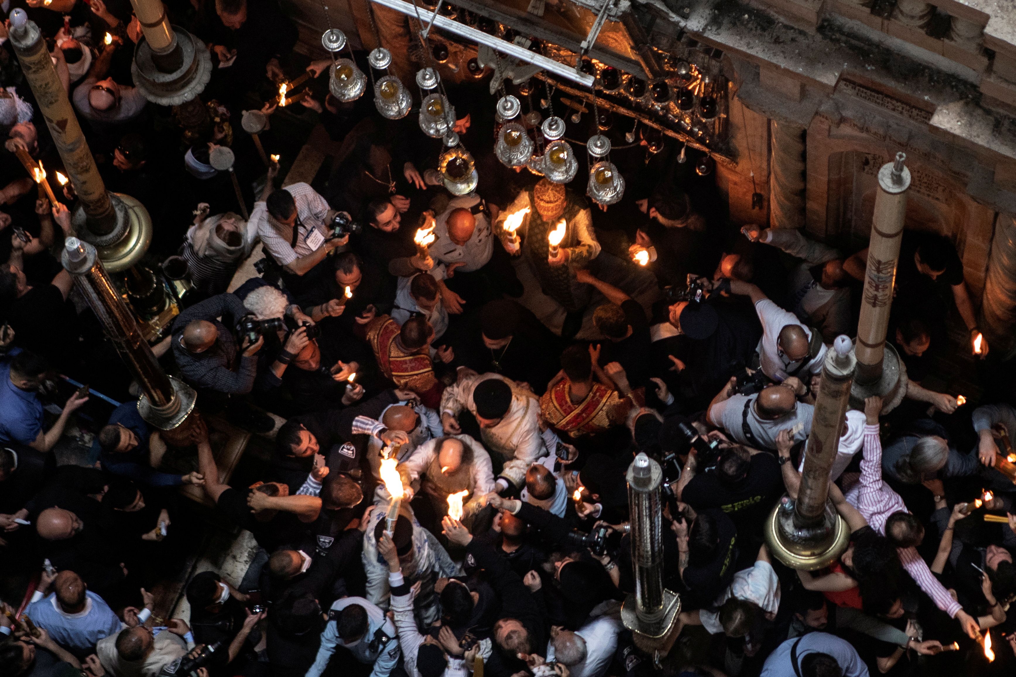 Holy Fire lights up Jerusalem's Holy Sepulchre | Reuters