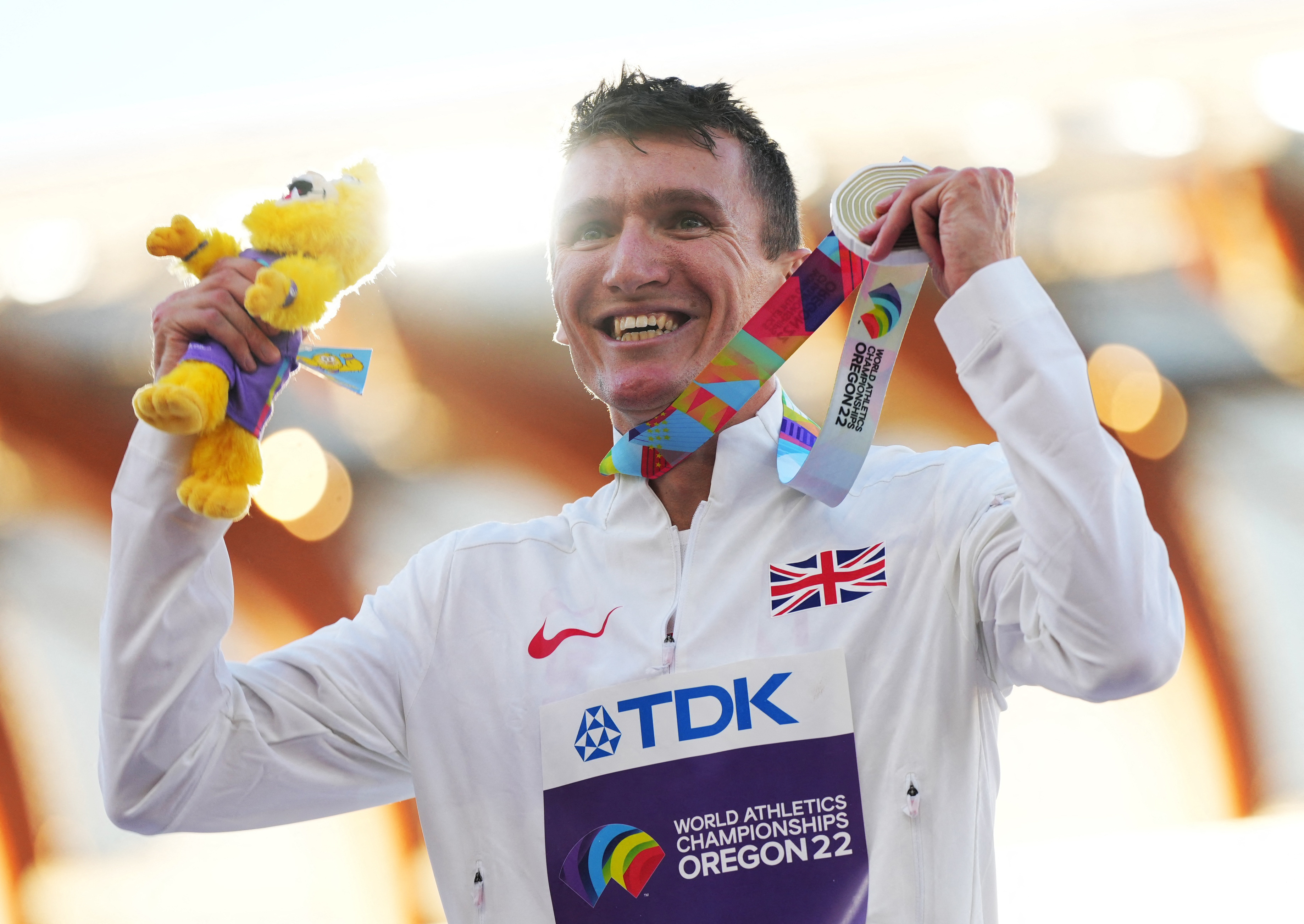 Briton Wightman takes surprise 1,500m gold with dad commentating | Reuters