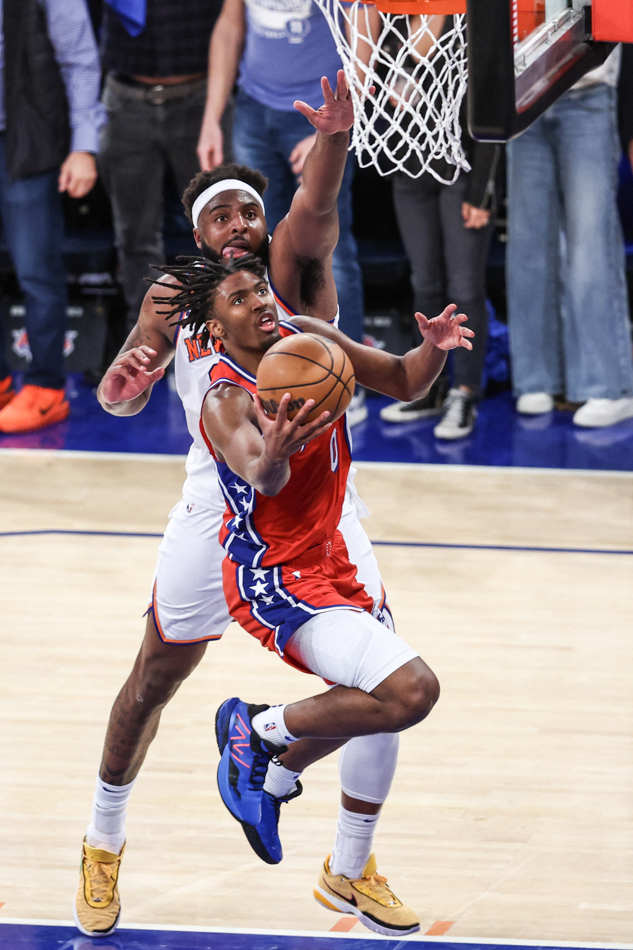 Knicks squander lead but hang on for Game 1 win over Sixers | Reuters