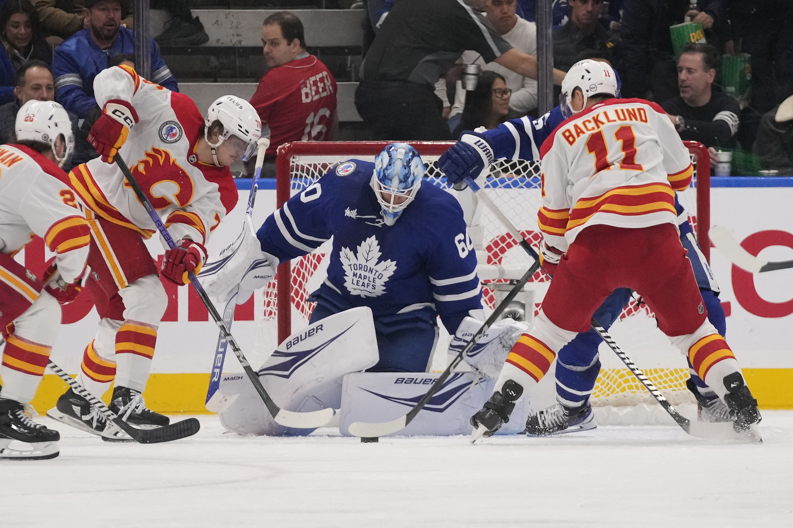 Leafs blow three-goal lead, top Flames in shootout | Reuters