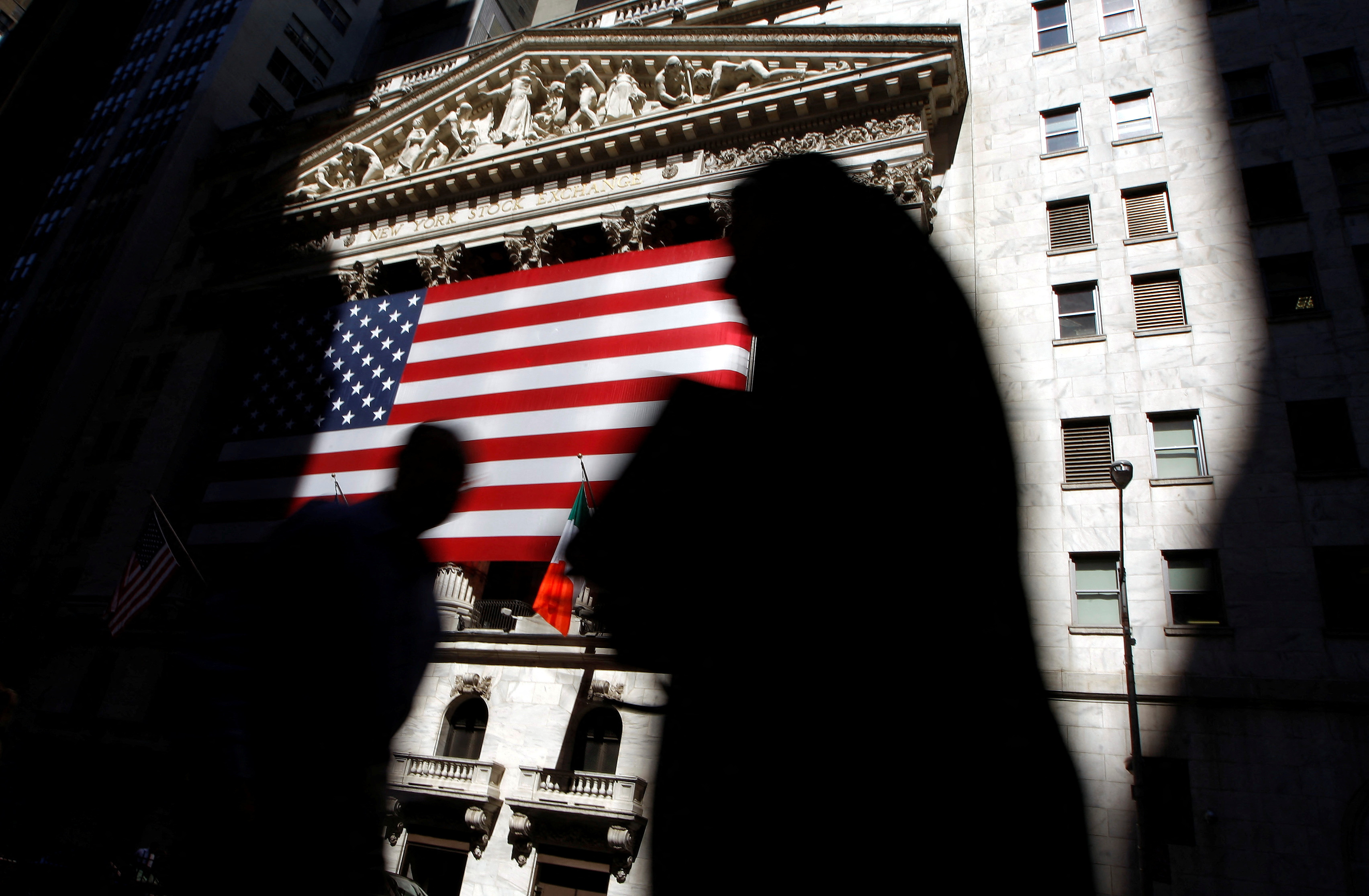 Securities trader charged in New York with front-running employer's ...