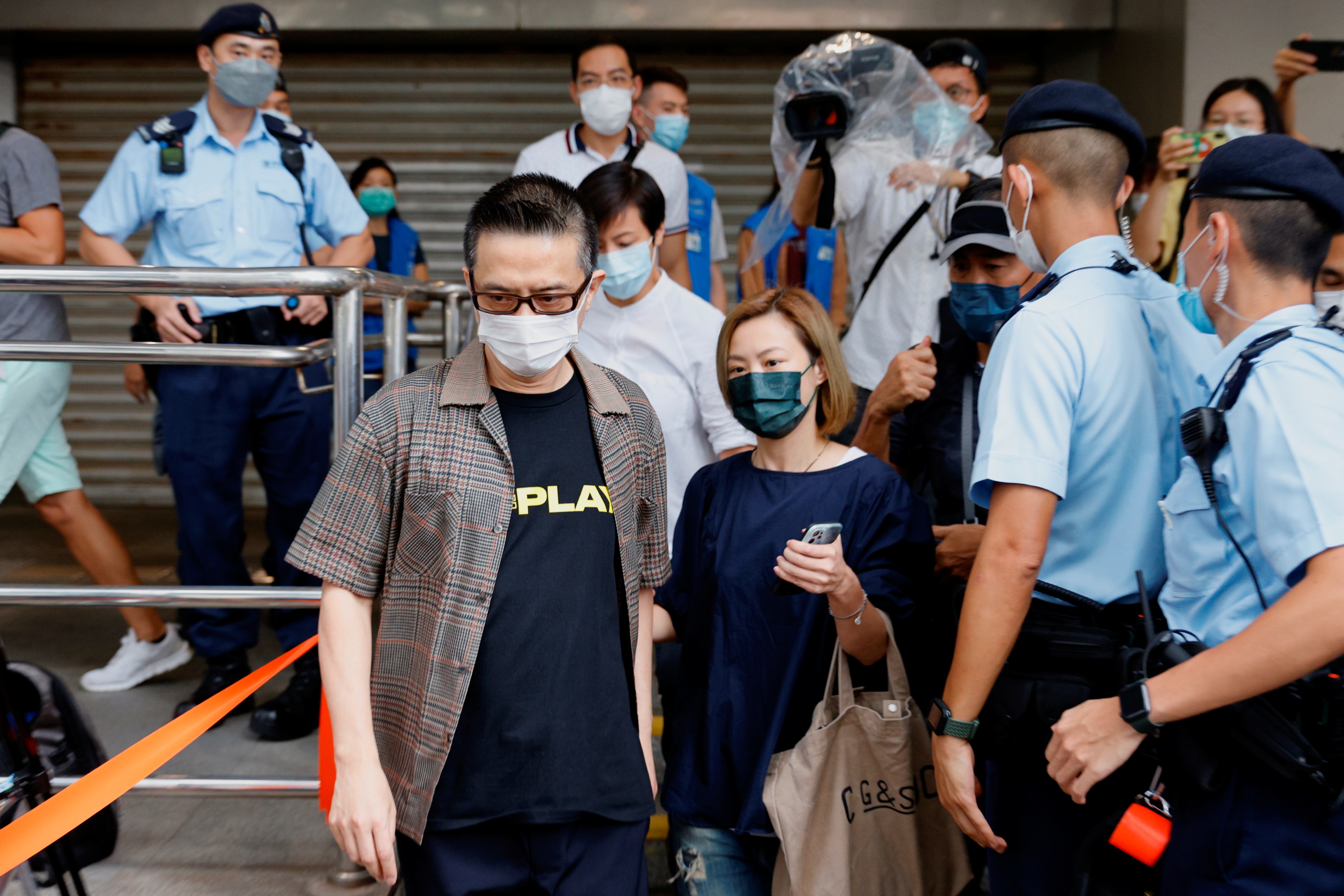 Hong Kong activist singer cleared of 'corrupt conduct' charge | Reuters