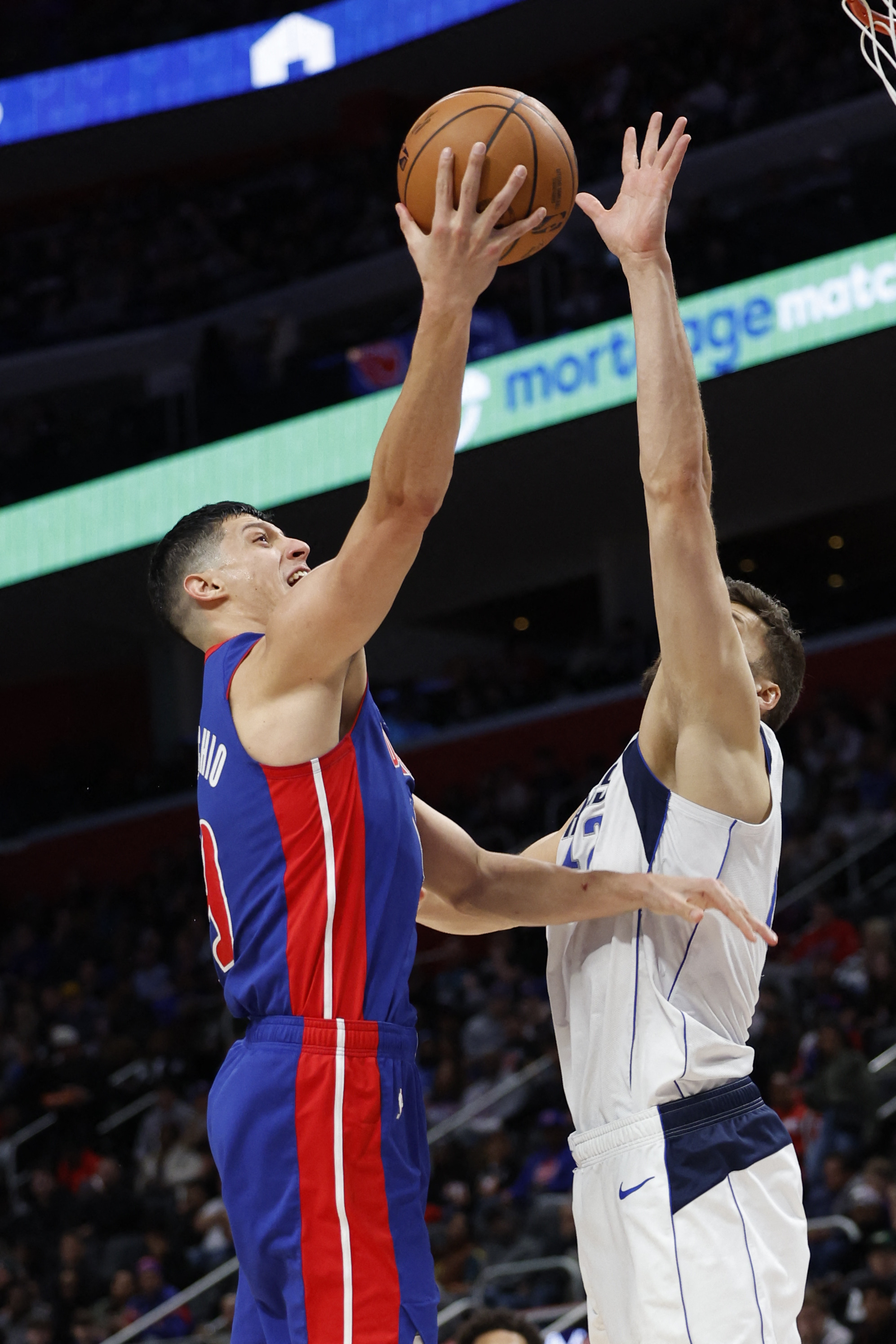 Luka Doncic sets triple-double mark as Mavs top Pistons | Reuters