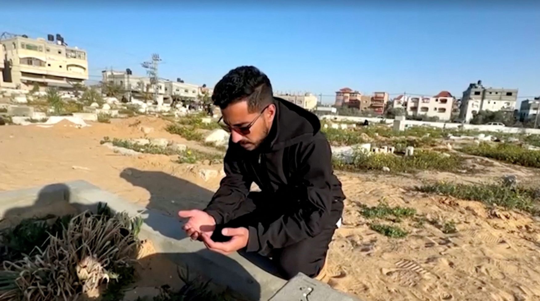 Mother's voicemail at her graveside marks painful Ramadan for Gaza son | Reuters