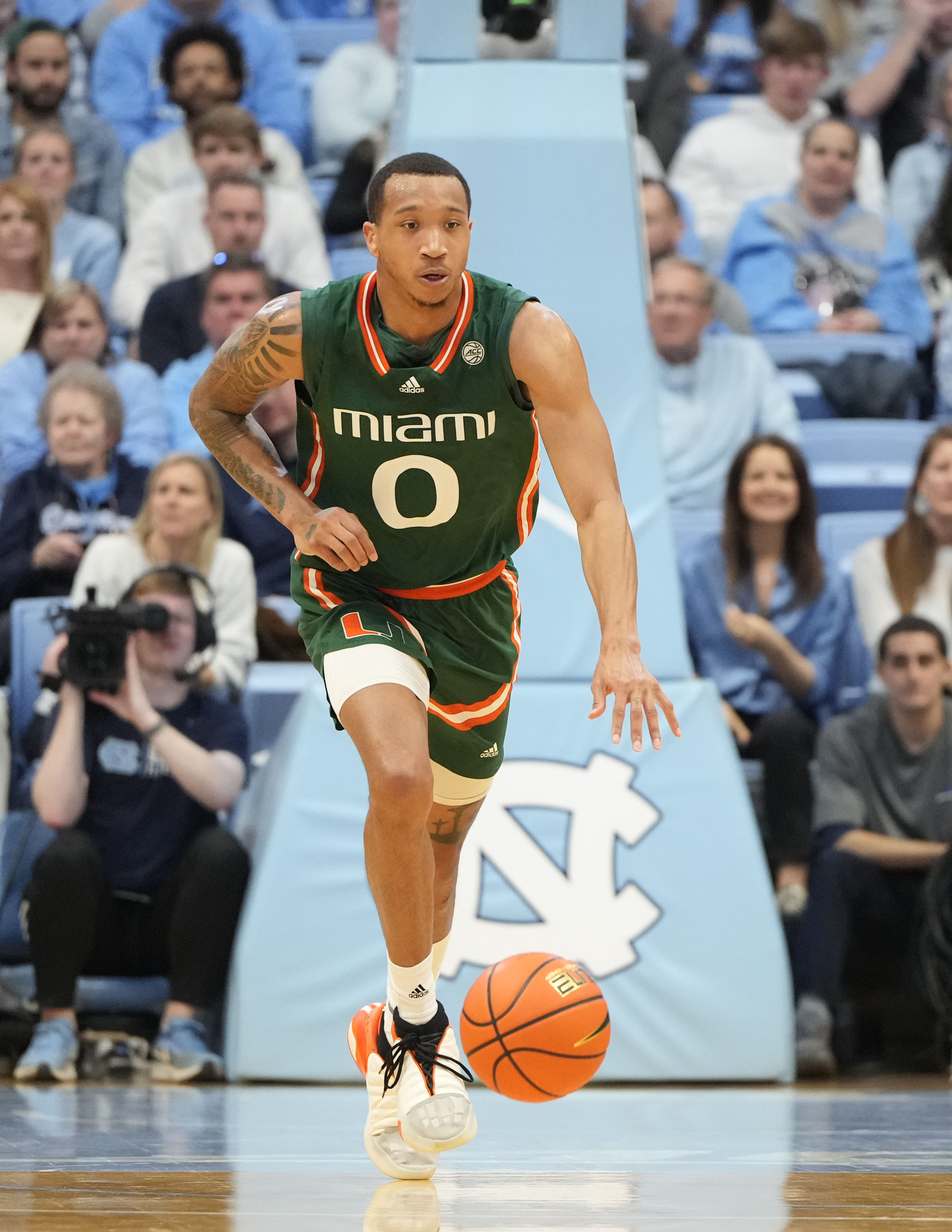 RJ Davis scores career-high 42, lifts No. 9 UNC past Miami | Reuters