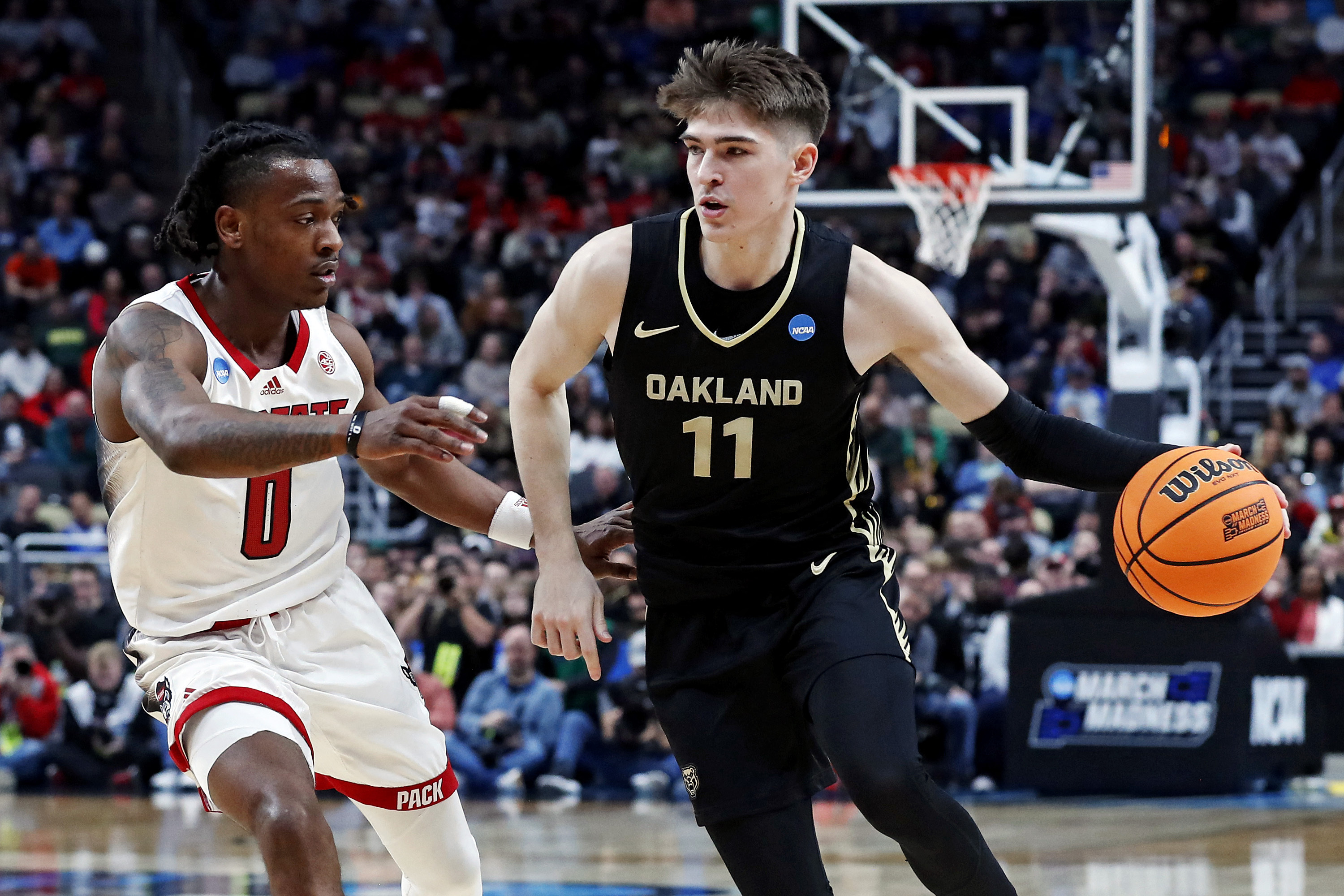 No. 11 North Carolina State outlasts No. 14 Oakland in OT | Reuters