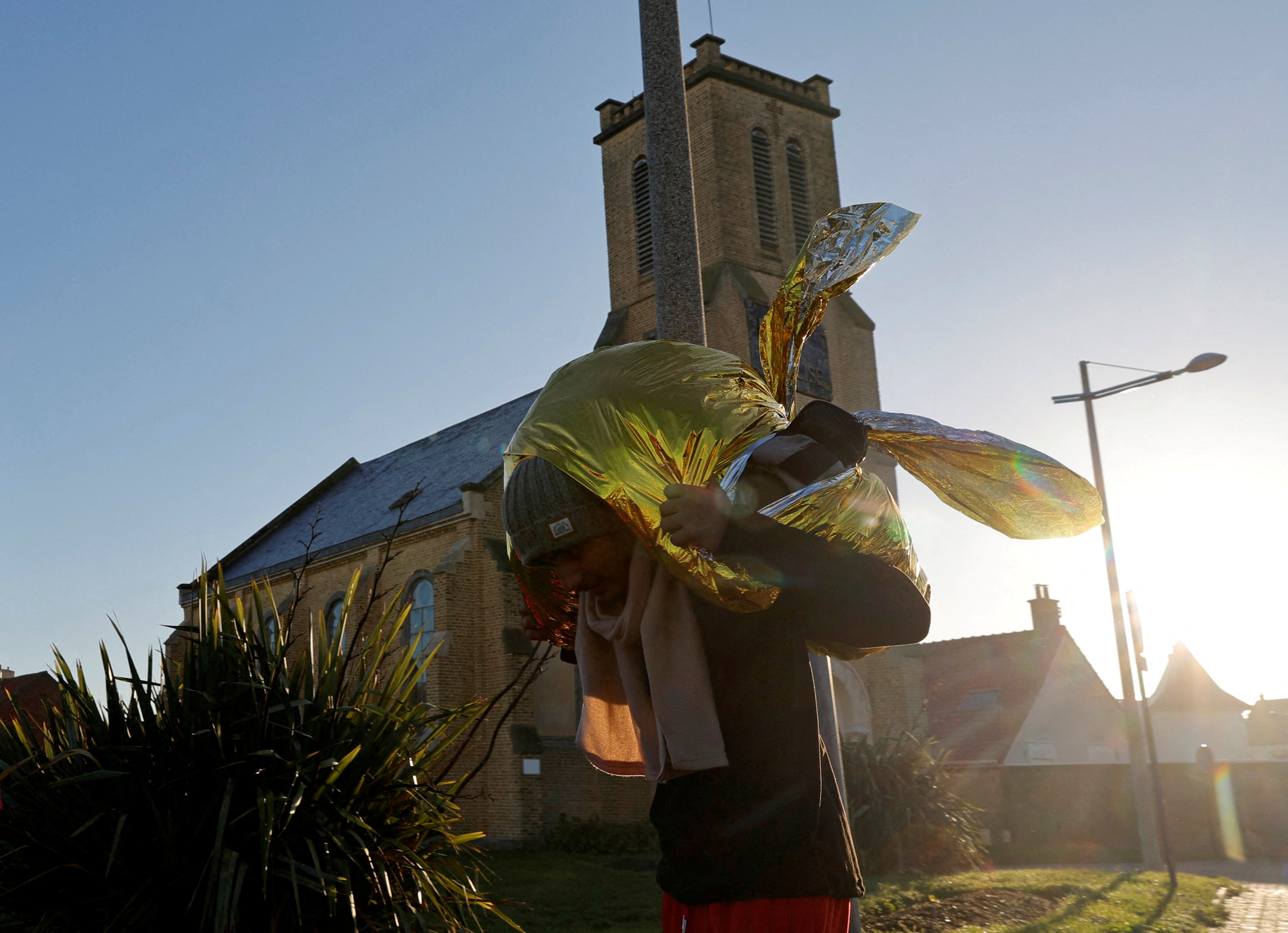 French police stop around 50 migrants on way to Britain | Reuters