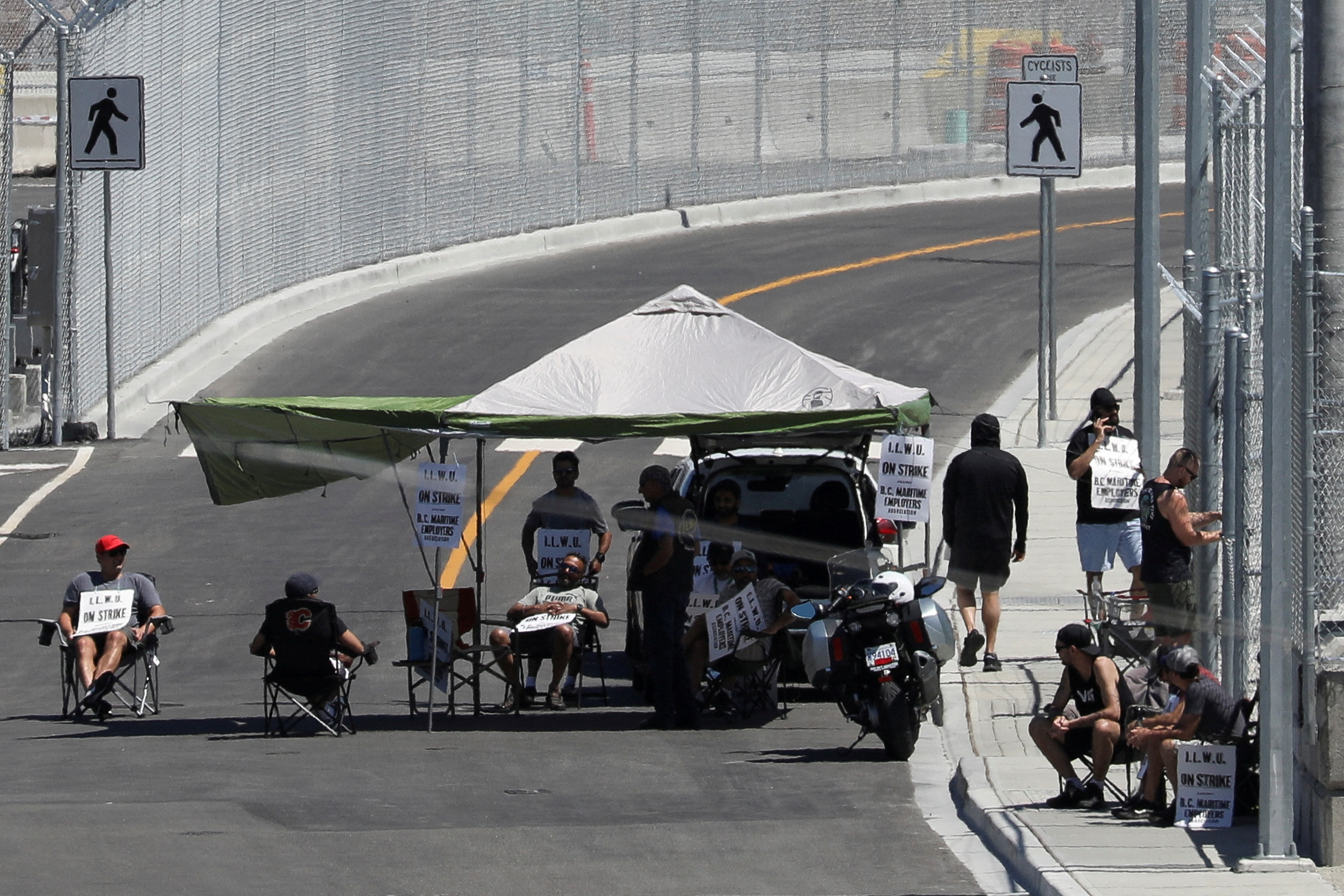 Thousands of port workers in Canada's British Columbia go on strike ...
