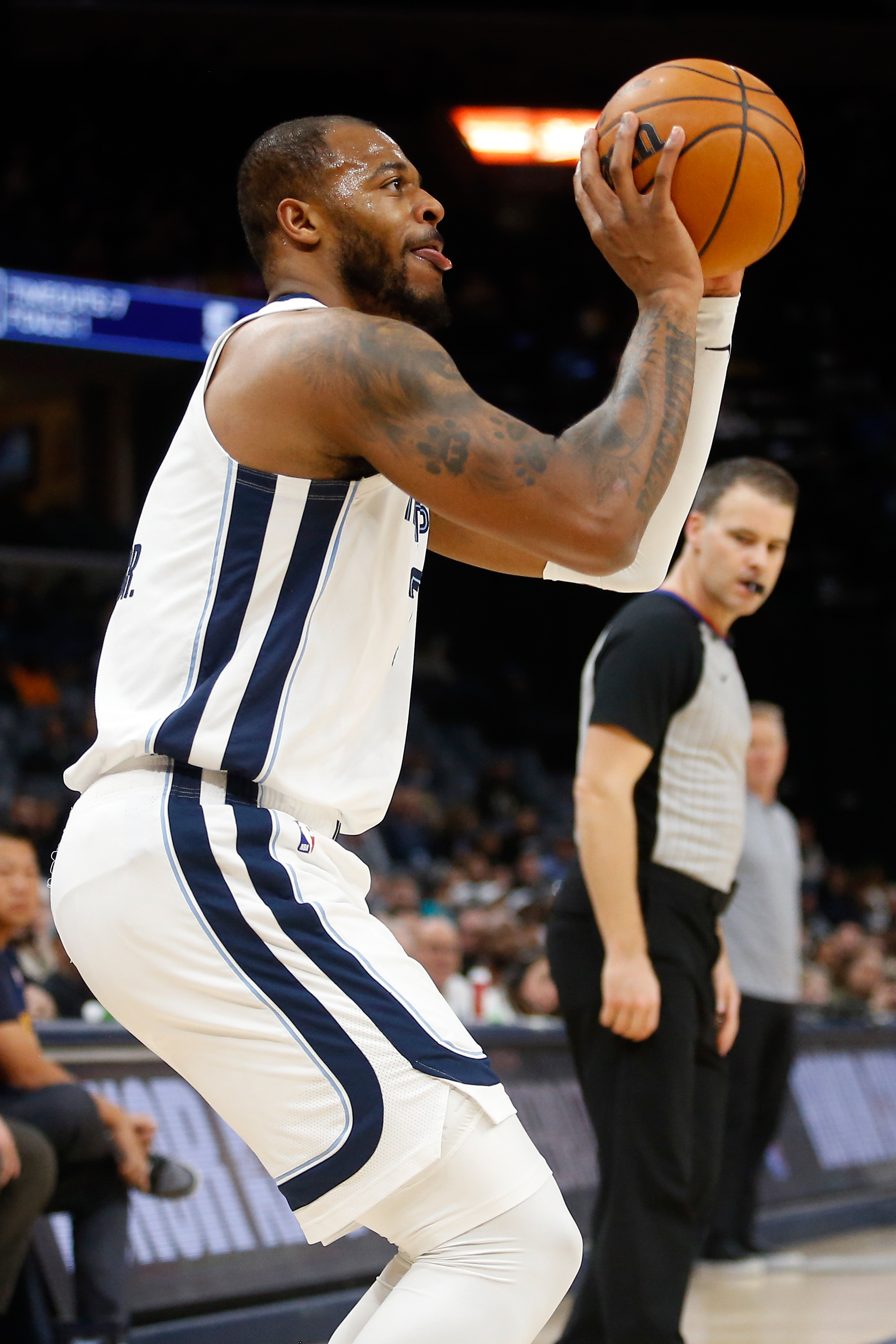 Grizzlies hold off Raptors to end losing streak | Reuters