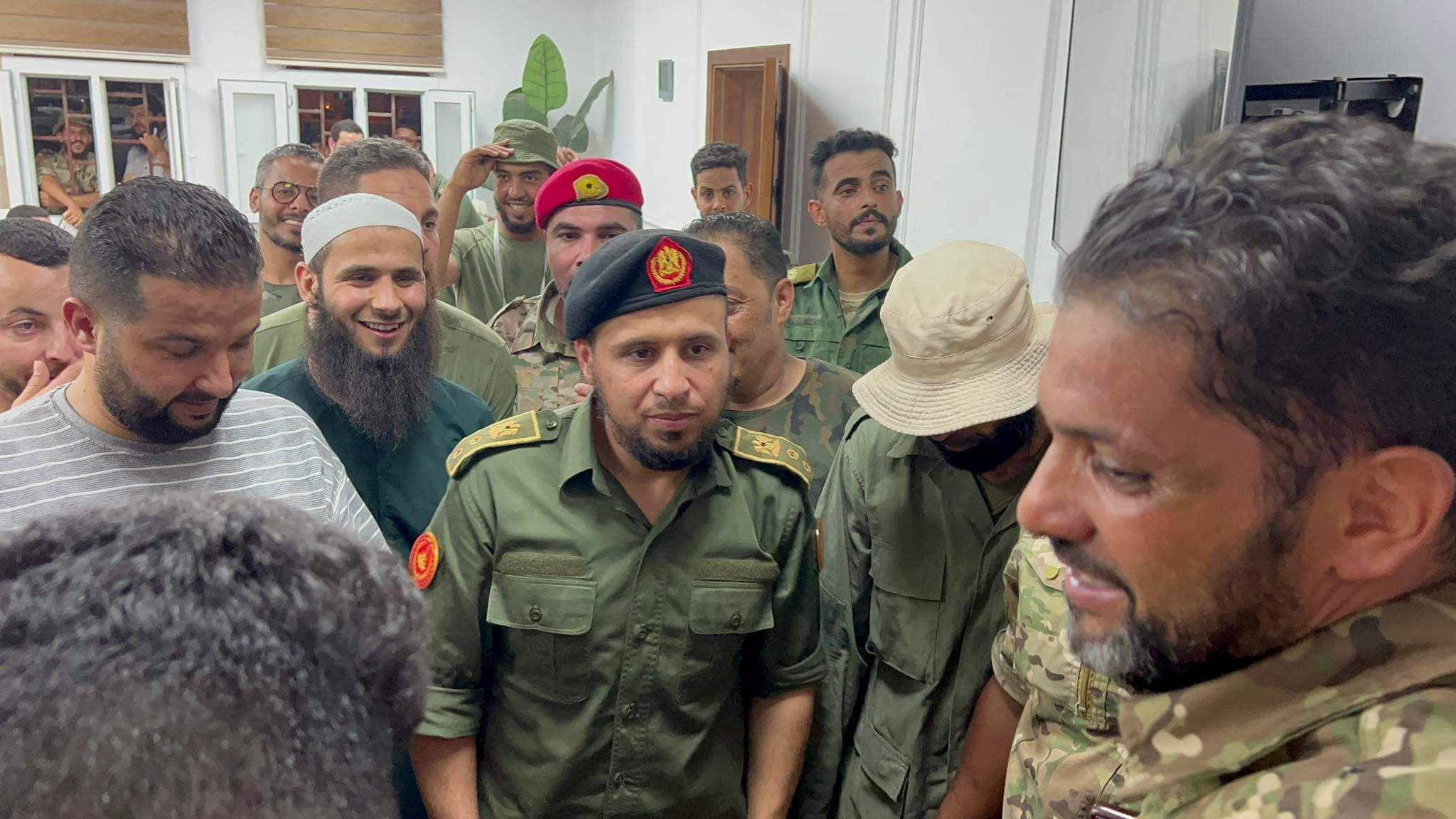 Captured Libyan commander rejoins unit after clashes kill 55 | Reuters