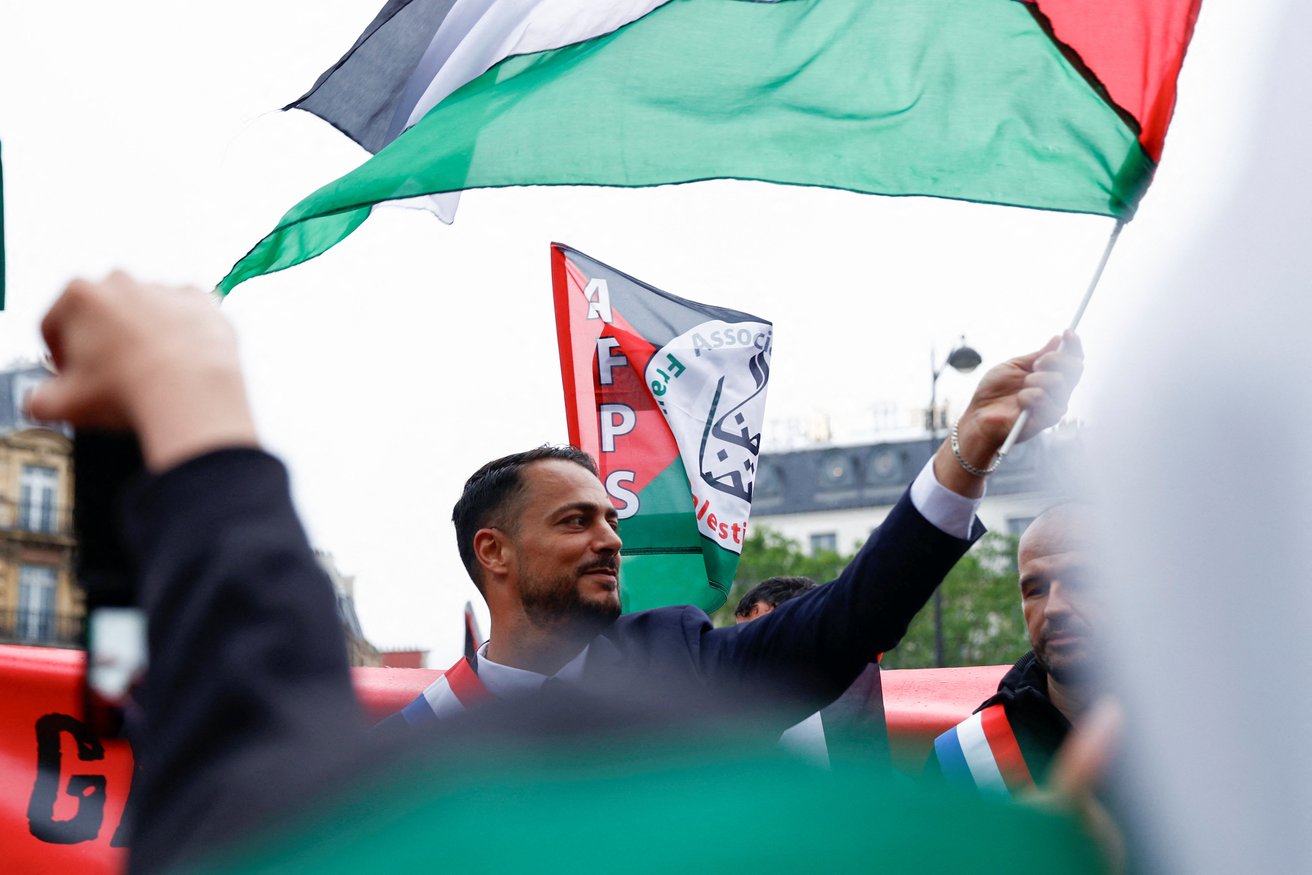 French MP says waving Palestinian flag was protest at 'massacre' in ...