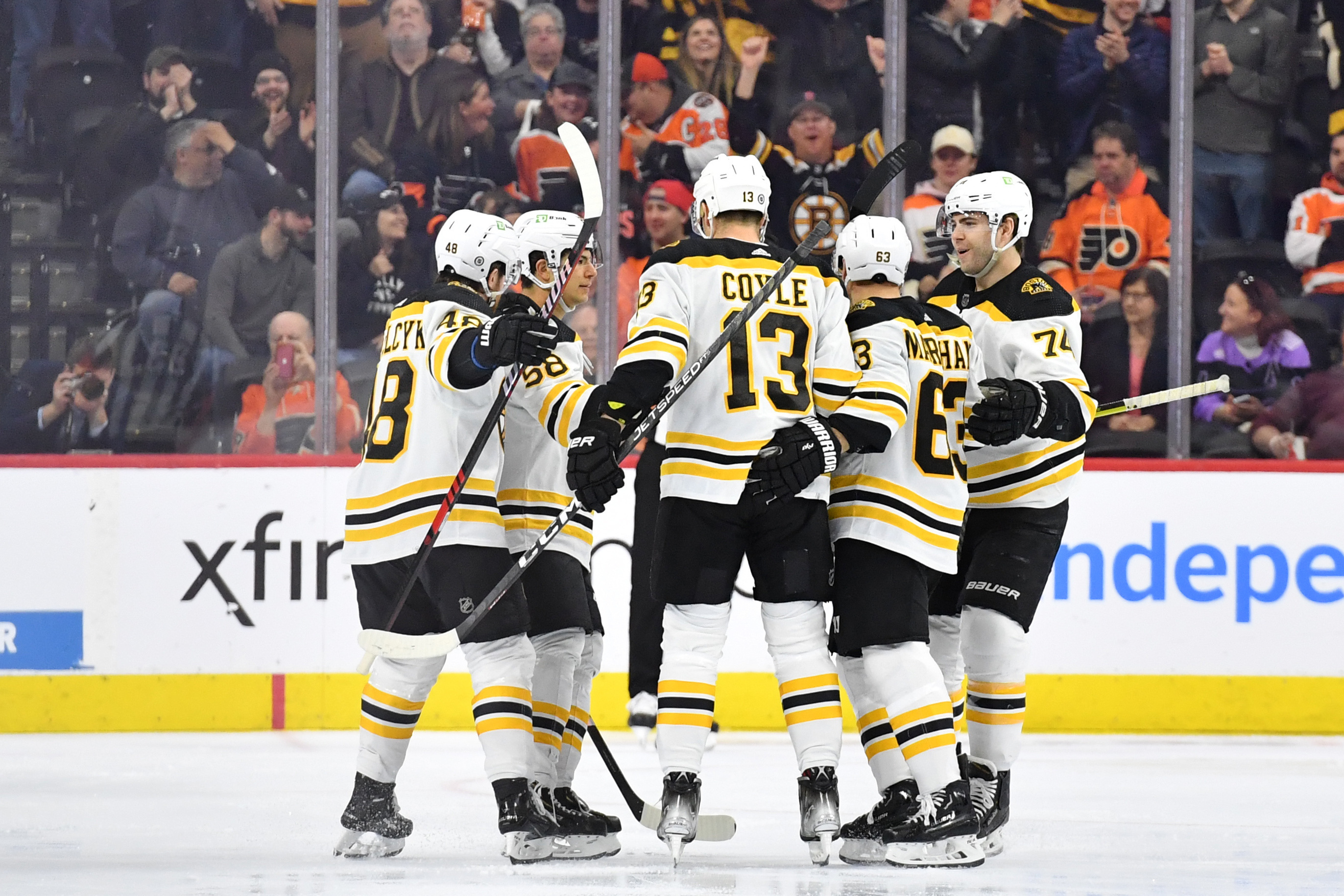 Bruins clip Flyers for NHL-record 63rd win | Reuters