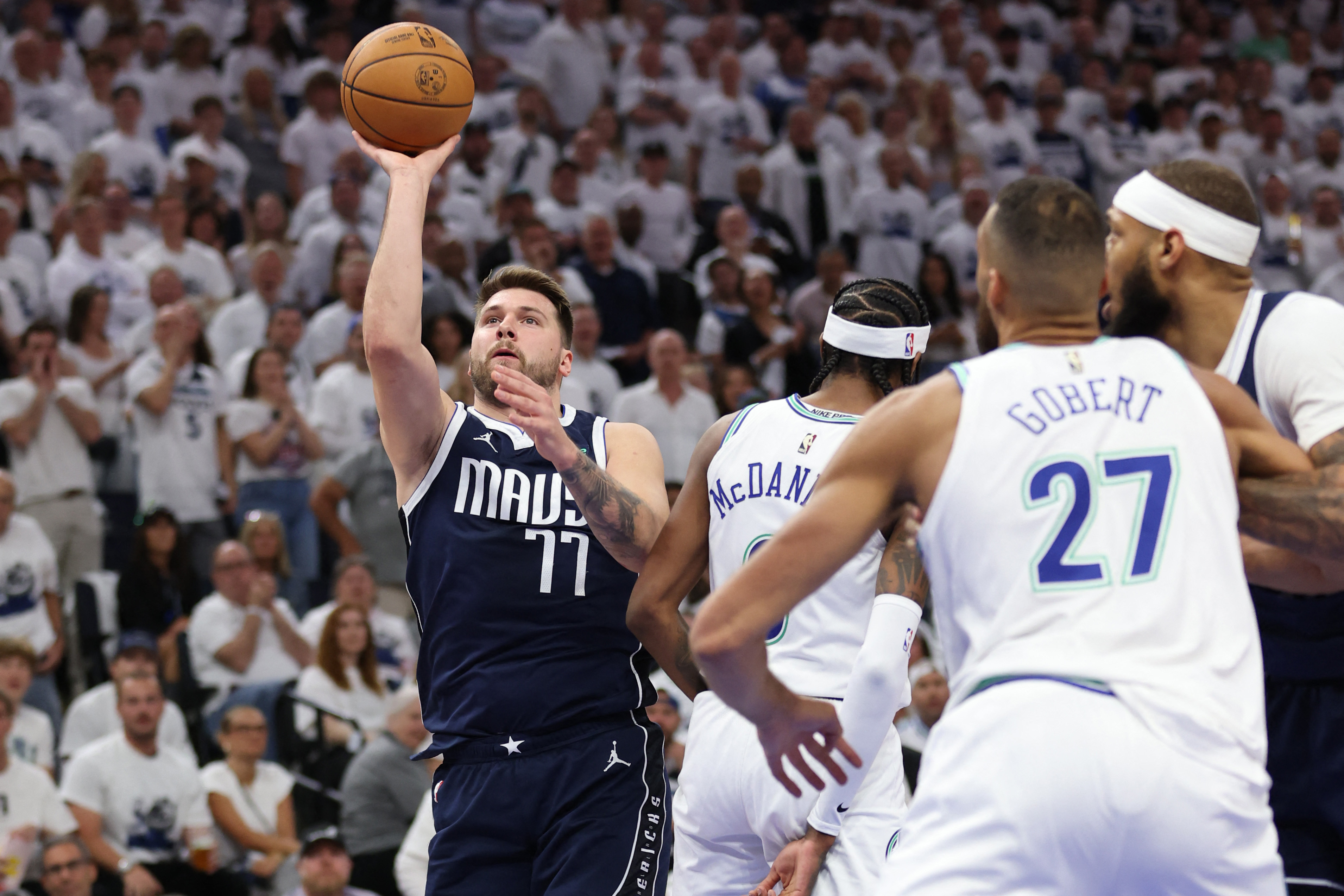 Luka Doncic helps Mavs take down Wolves in Game 1 | Reuters
