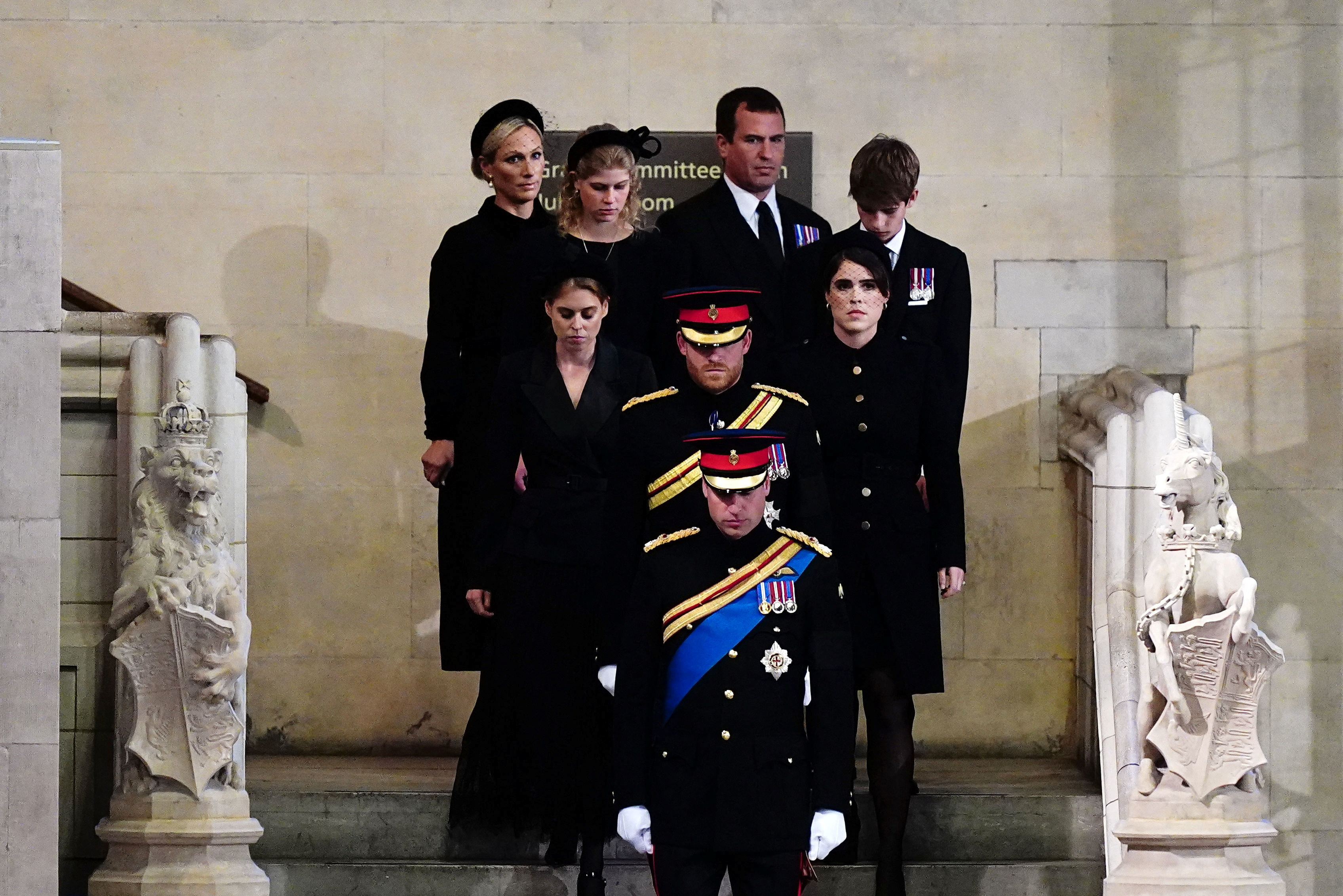 William and Harry stand vigil with cousins at queen's coffin | Reuters