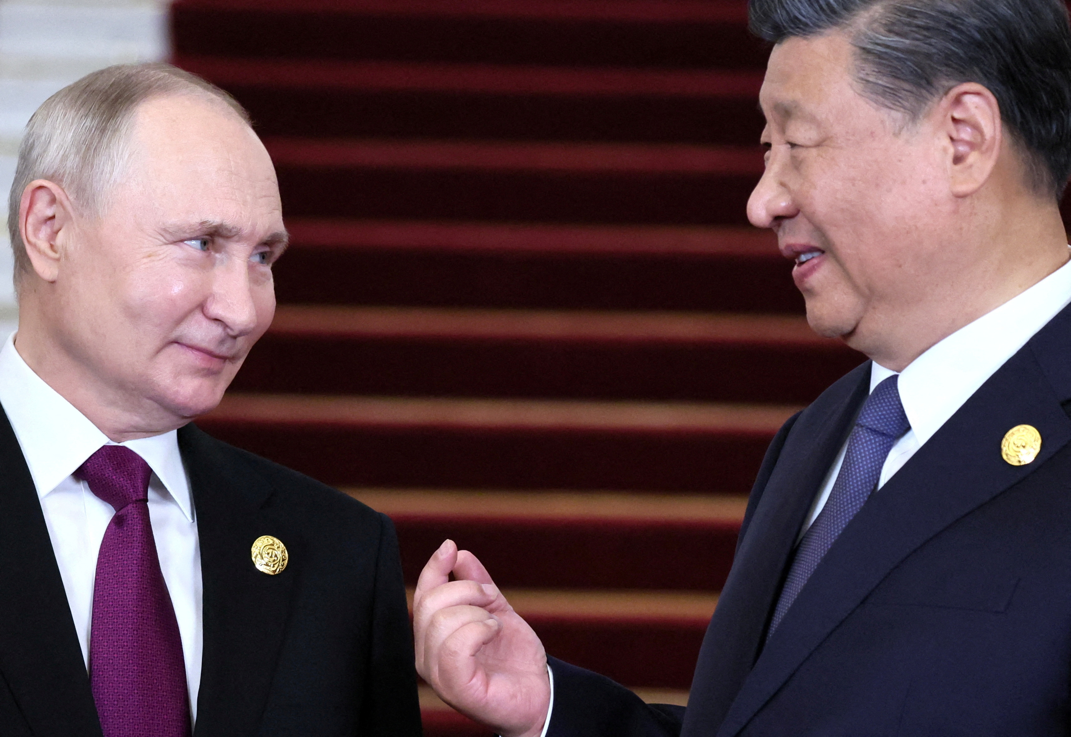 Putin and Xi reject US 'interference', praise their own ties and trade ...