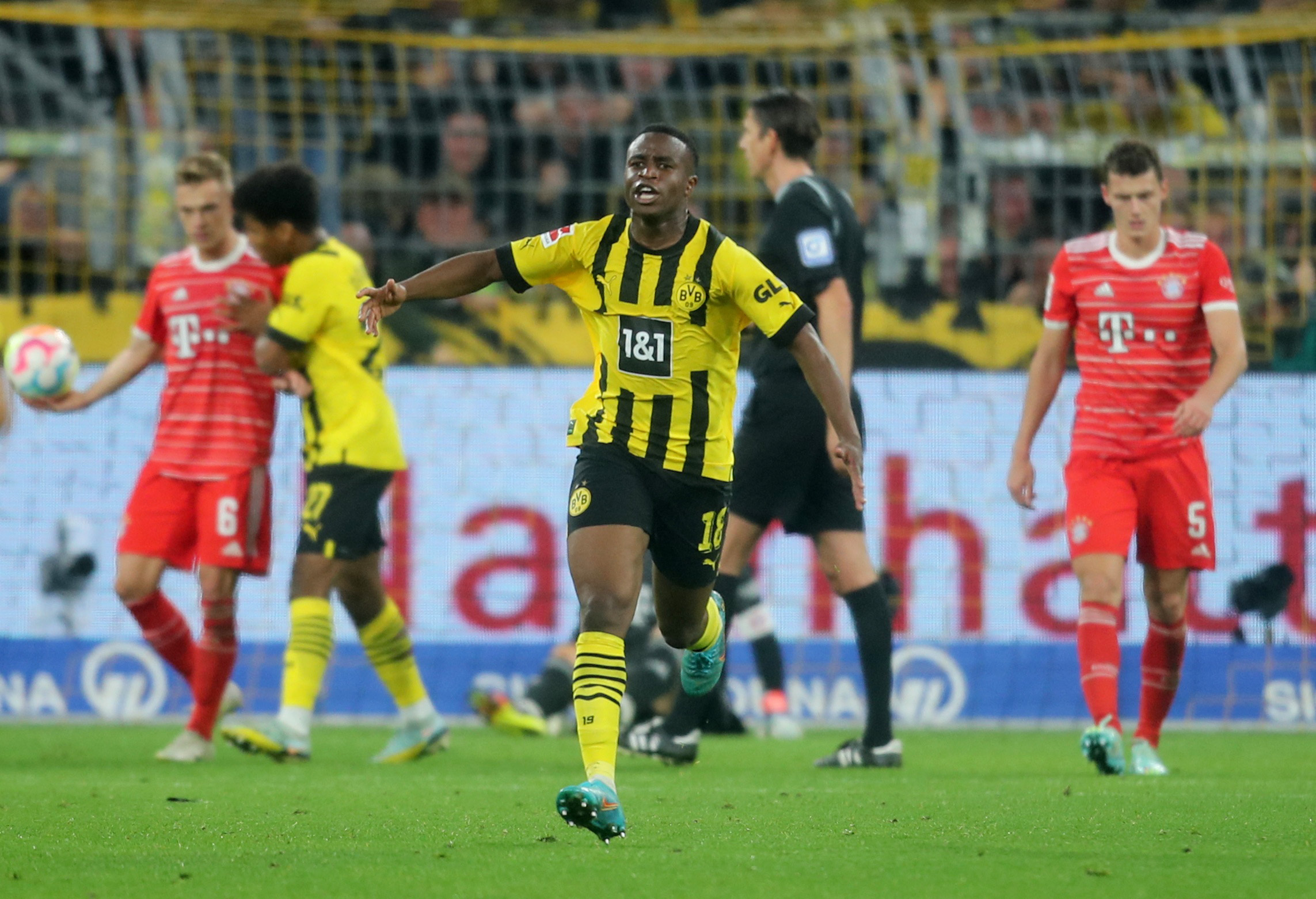 Last-gasp Modeste goal rescues 2-2 draw for Dortmund against Bayern ...